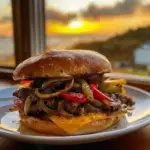 Ultimate Philly Cheesesteak Burger with Sautéed Peppers, Onions, and ...